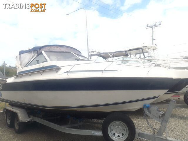 USED MUSTANG 2400 HALF CABIN 1990 POWERED BY 200 HP 2 STROKE MERCURY 2006