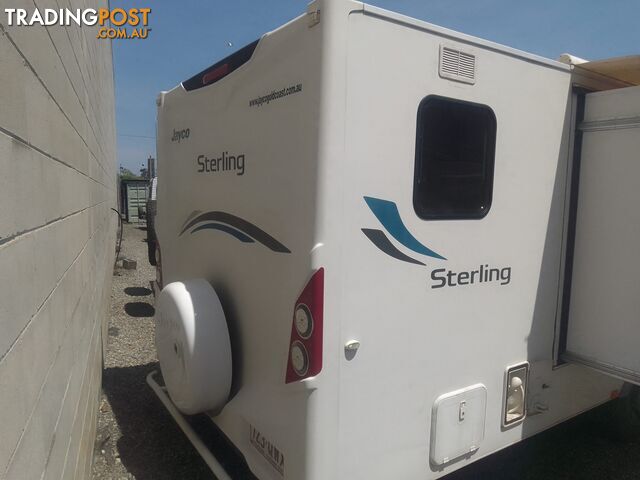 USED 2013 JAYCO STERLING 25FT SLIDE A SIDE DUAL AXLE TOURING CARAVAN