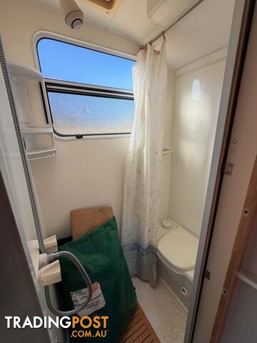 ROADSTAR VOYAGER 2000 ENSUITE VAN ISL DBL ROLLOUT W WALLS AIRCON TANDEM HWS